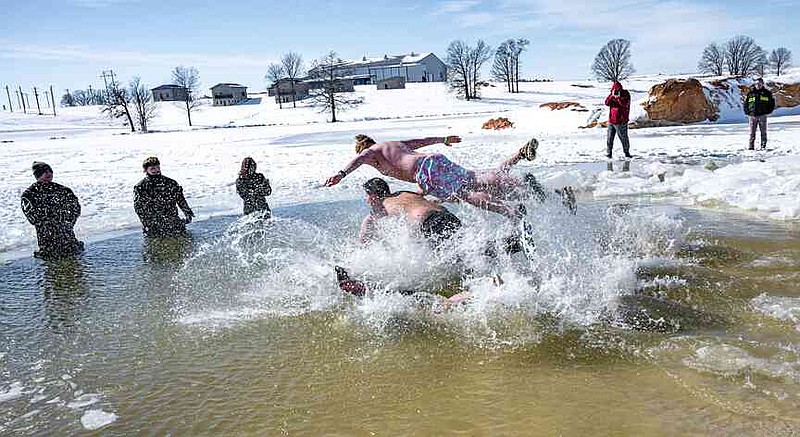 State Tech students, staff dive into icy lake for SOMO | Jefferson City ...