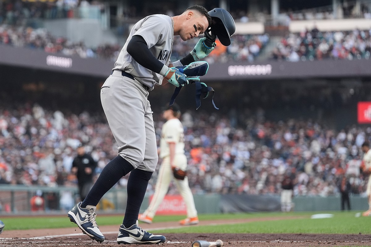 MLB opener includes first robo-umpire challenge, hitless Aaron Judge ...