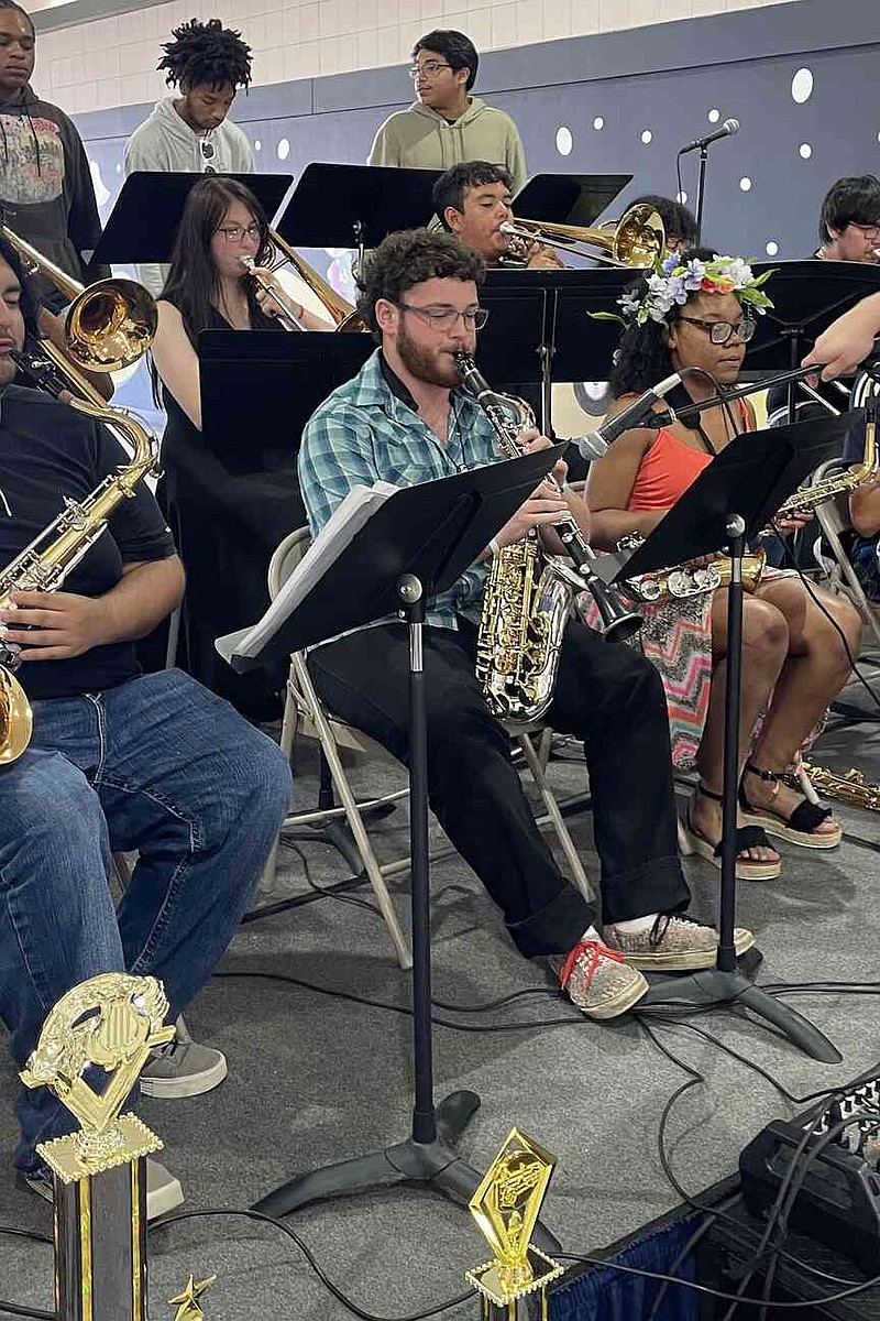 Reece Weaverling, center, improvises a clarinet solo during the Hope ...