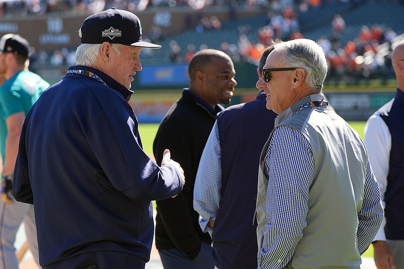 Seattle Mariners owner John Stanton, left, talks with MLB commissioner ...