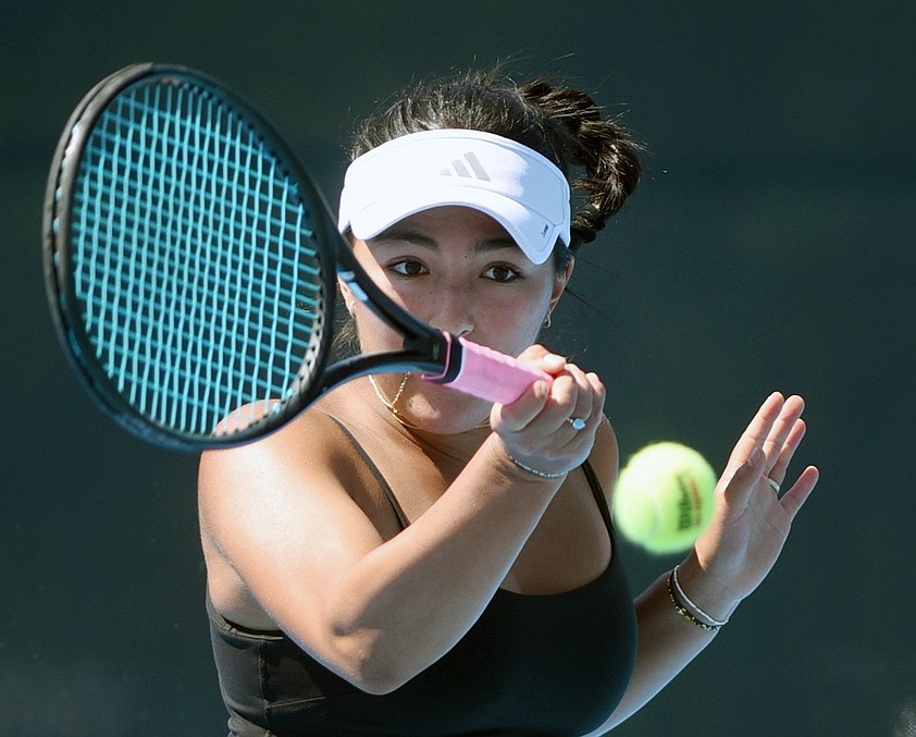 Staff photo by Matt Hamilton / GPS tennis player Maud Fiorello returns ...