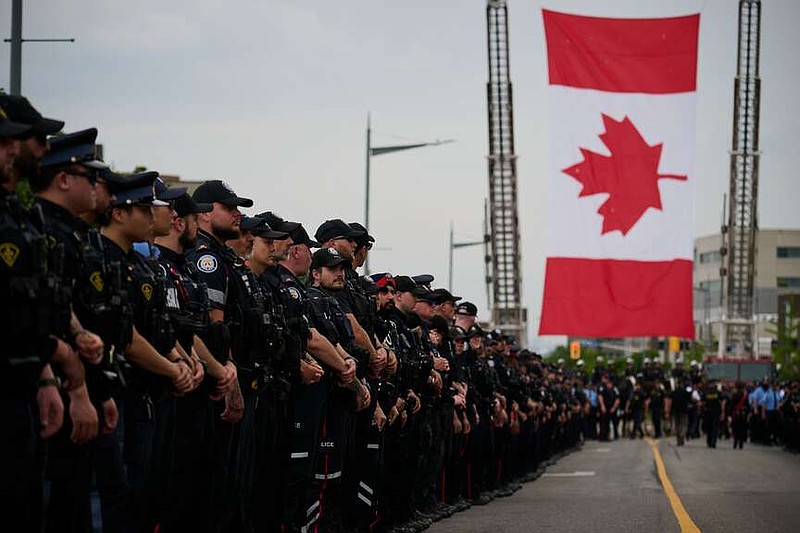 Police officer in Toronto killed in shooting linked to investigation of ...