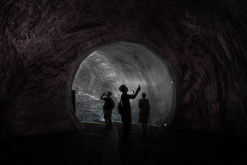 Monumental cave art on Paris' oldest bridge finally opens, as the ...
