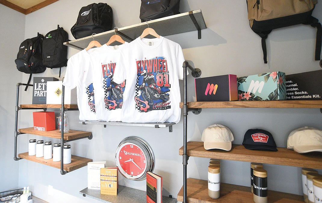 Flywheel Brands crafts custom, client-branded merchandise and print ...