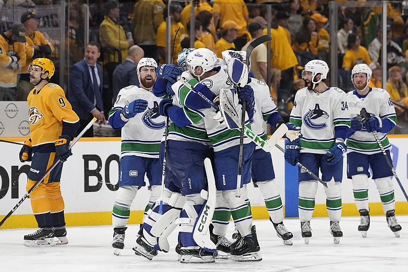 Predators trail 3-1 after blowing late lead, losing to Canucks in OT ...