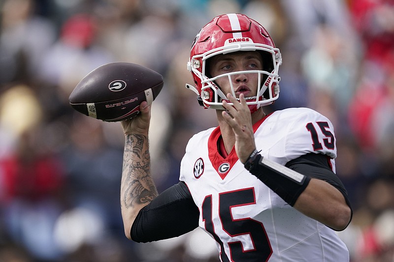 College football notebook: Trio of SEC QBs make cover of rebooted video ...