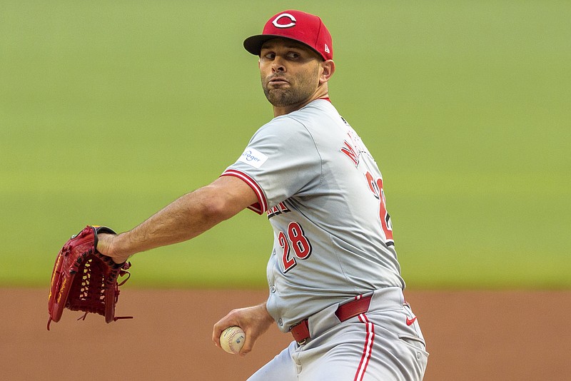 Martinez retires 17 straight batters as the Reds beat the Braves ...