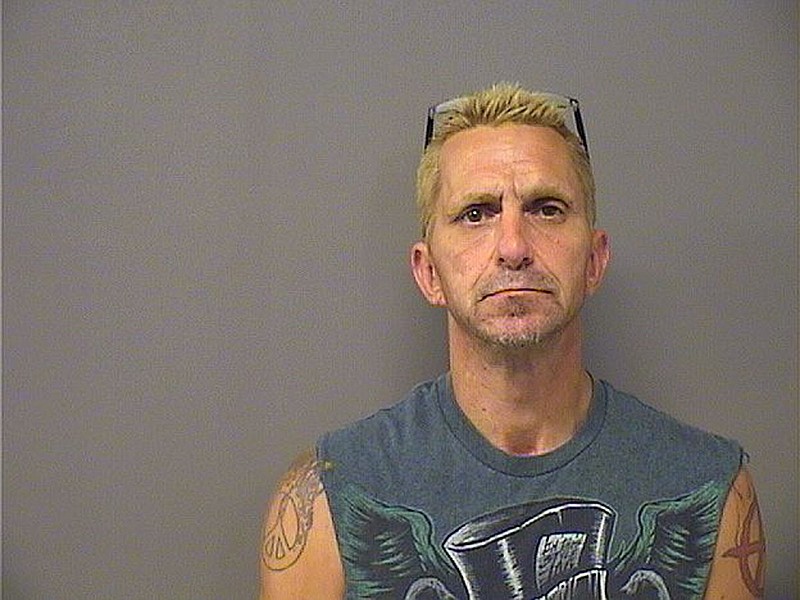 Local man charged with May stabbing