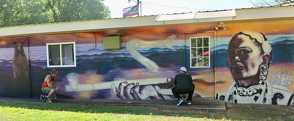Area artist paints native American mural