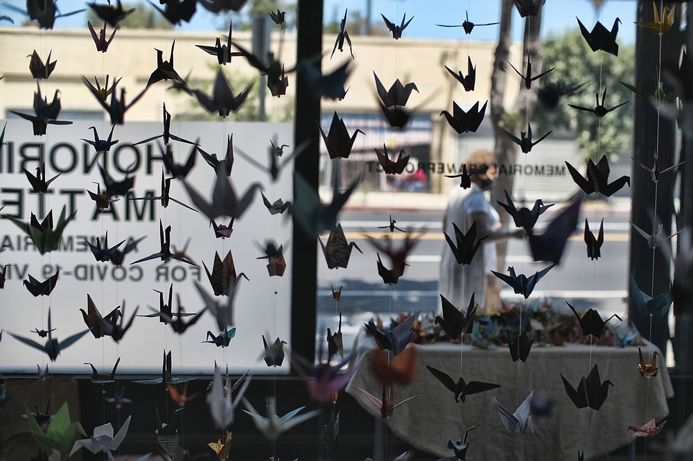 Artist creates origami cranes memorial for victims