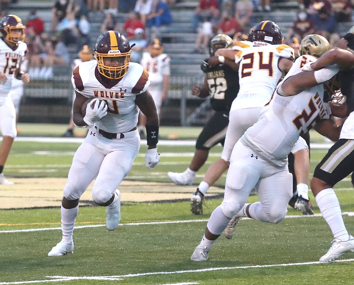 Wolves hold off Trojans after early lead | Hot Springs Sentinel Record