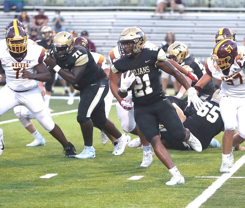 Wolves hold off Trojans after early lead | Hot Springs Sentinel Record