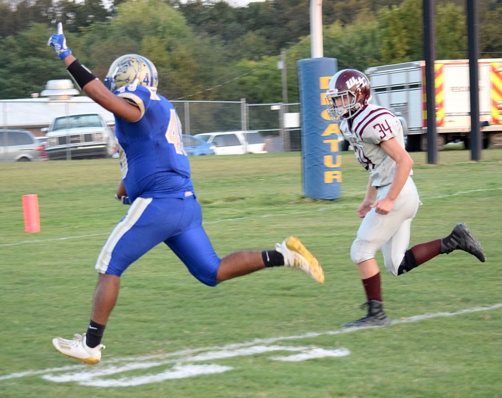 Bulldogs overwhelm Wolverines for win