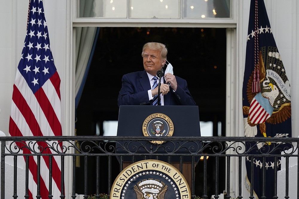 Stepping out, Trump talks briefly to crowd