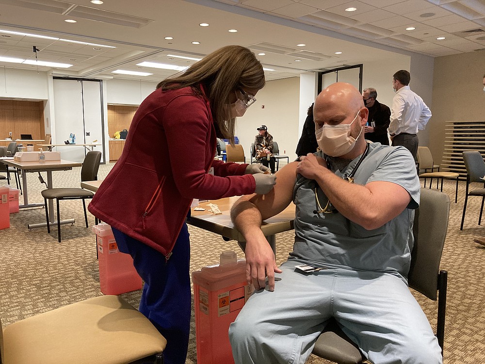 Hospitals begin vaccinating staff members against covid-19