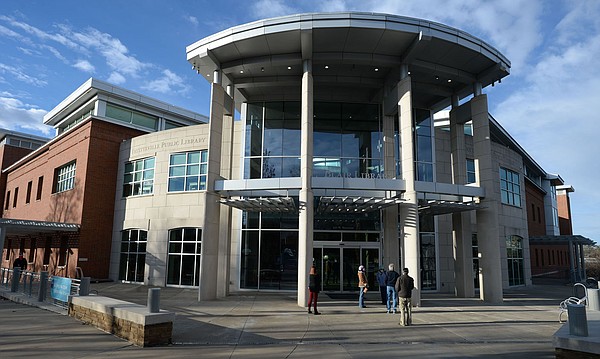 Fayetteville library patrons celebrate quiet reopening | Northwest ...
