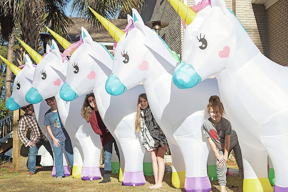 Inflatables bring unexpected joy to man's neighborhood