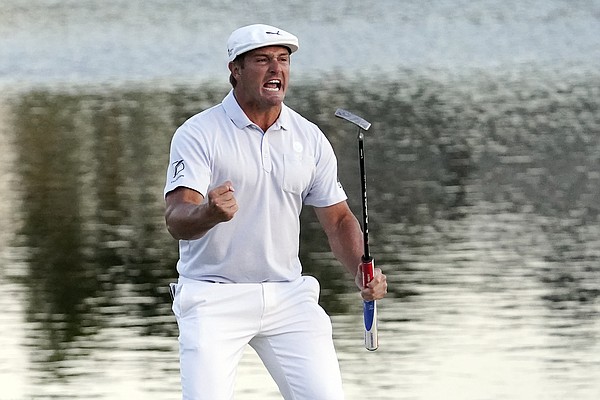 DeChambeau outlasts Westwood with big drives, putts