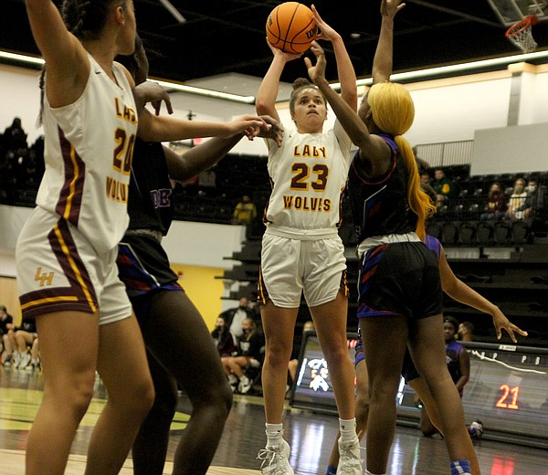 GALLERY: Lady Wolves outstretched by Lady Blue Devils | Hot Springs ...