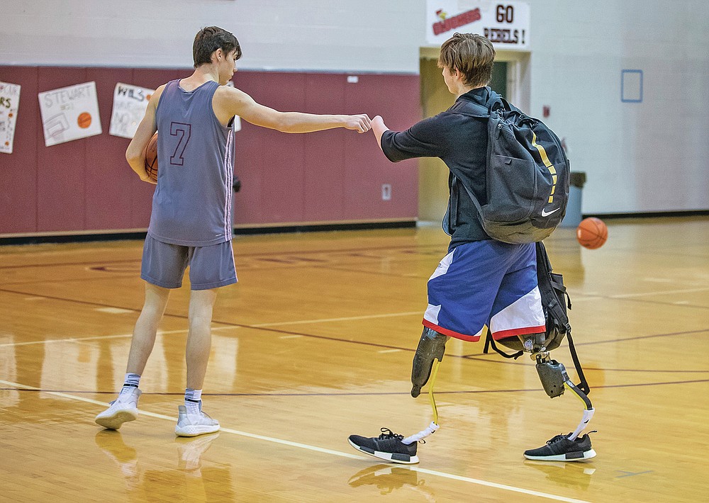 'Just watch me': Indiana basketball player has prosthetic legs and no hands