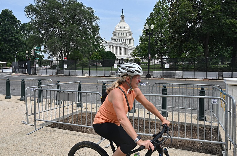 Capitol fencing mostly gone, visitors again chill on plaza