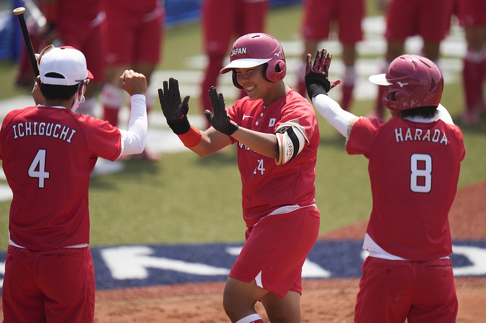 Japan tops Australia in softball as delayed Tokyo Games open