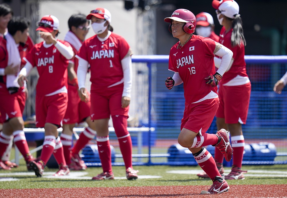 Japan tops Australia in softball as delayed Tokyo Games open
