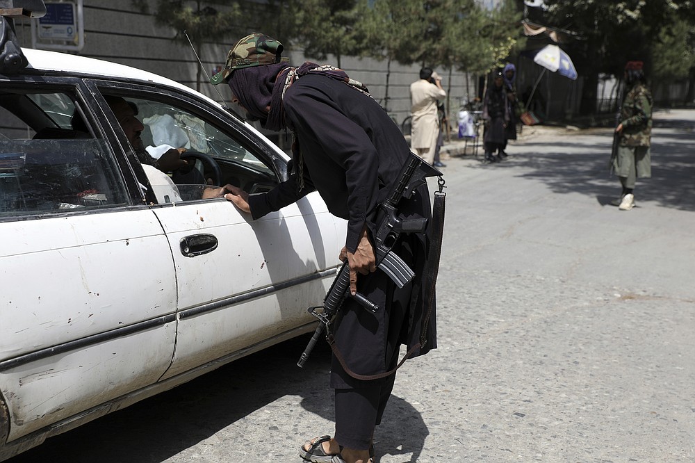 Crush at Kabul airport kills 7 as Afghans try to flee