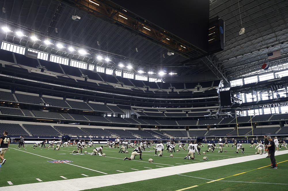 Saints return to practice field -- in Texas