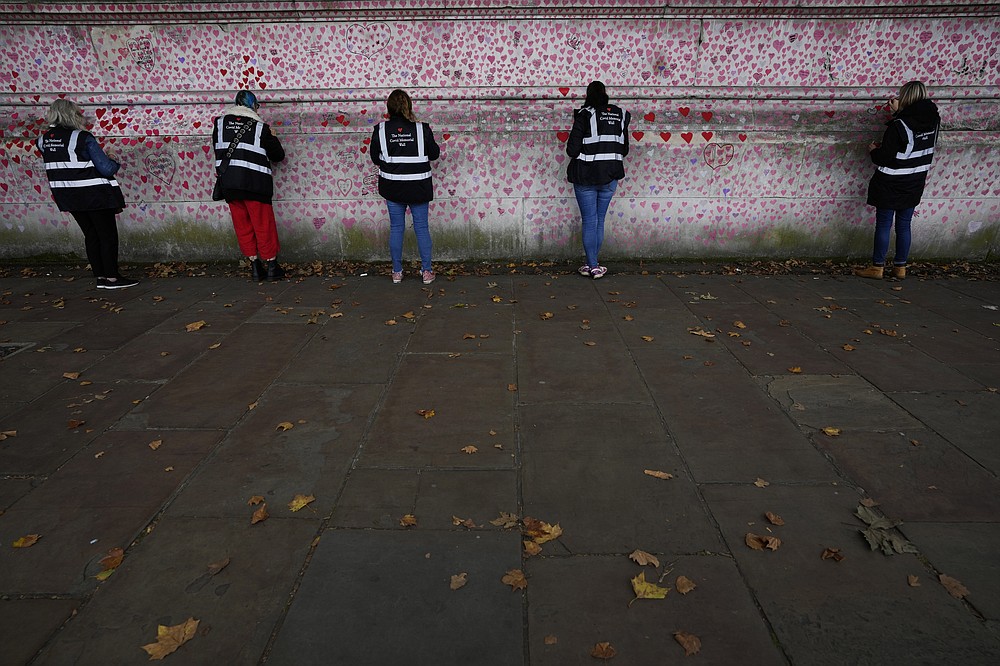 Memorials honor COVID-19's 5 million dead