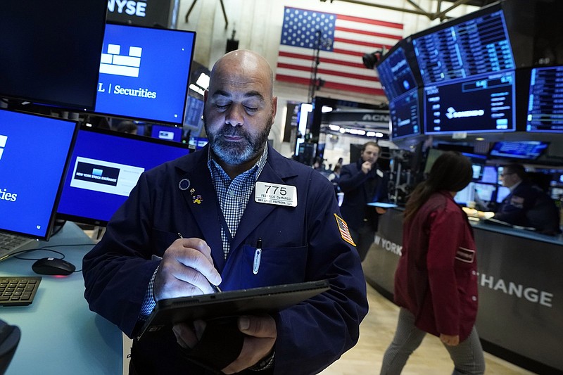 Major stock indexes eke out more record highs