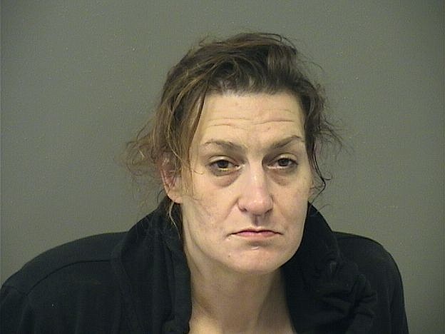 Homeless woman asleep at the wheel found with drugs, counterfeit money ...