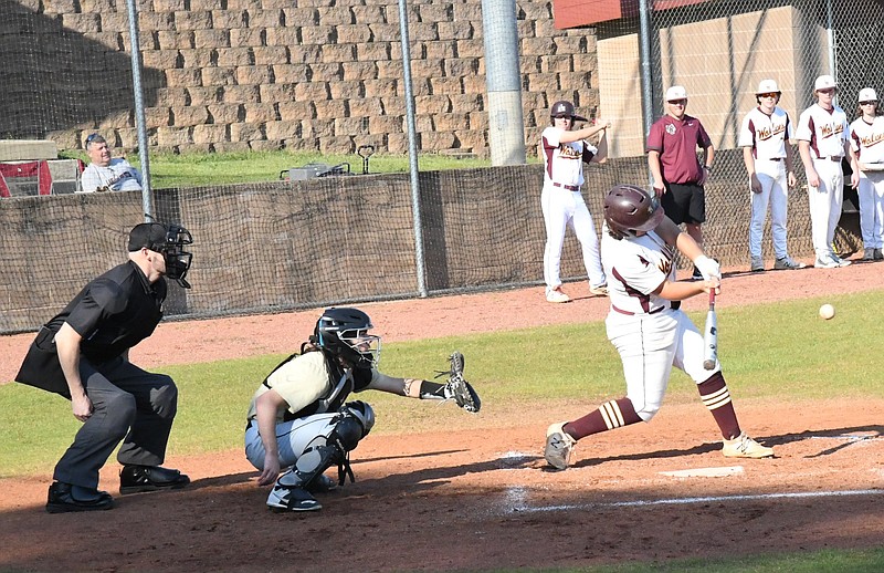 VIDEO, GALLERY: Wigand earns 100th career win as Wolves down Trojans ...