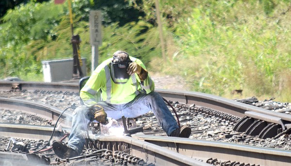 Fixing a crack in the rails | Westside Eagle Observer