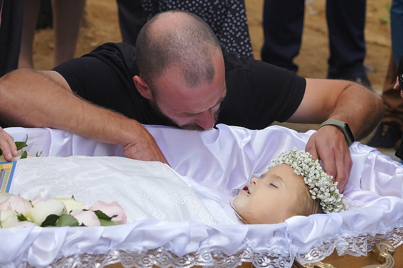 'Evil cannot win': Killed by Russian missile, Liza is buried ...