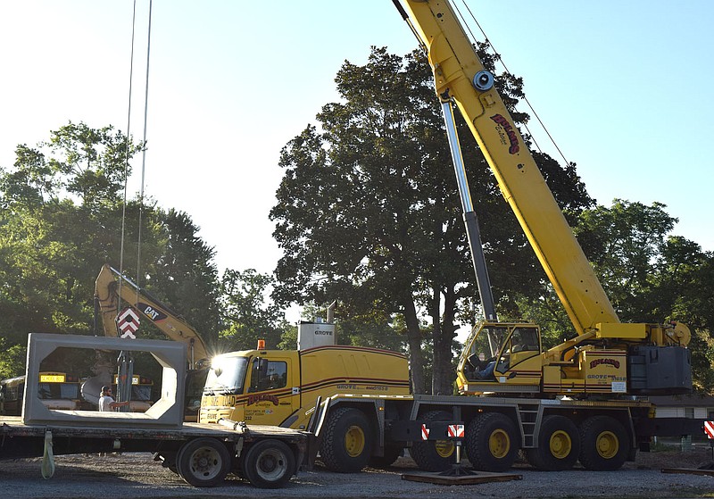 Concrete casing lowered into place begins temporary bypass | Westside ...