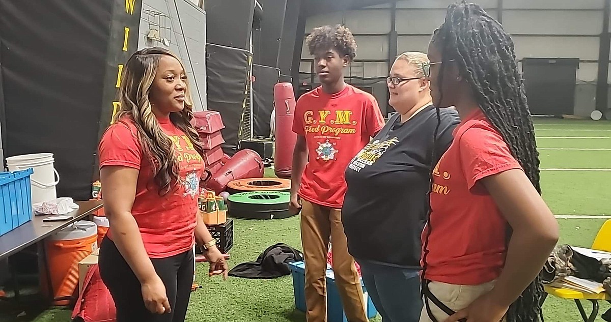 ‘Ms. Pinky’ gives back to WCSD | Northwest Arkansas Democrat-Gazette