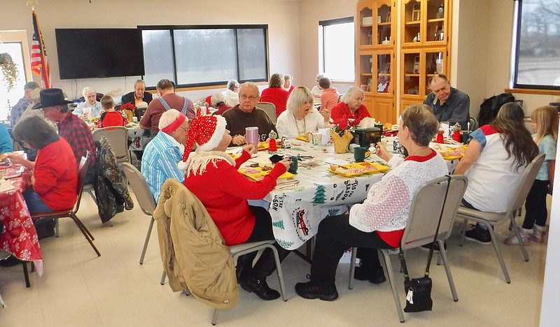 Celebrants enjoy Christmas activities, dinner at Billy V. Hall Senior ...