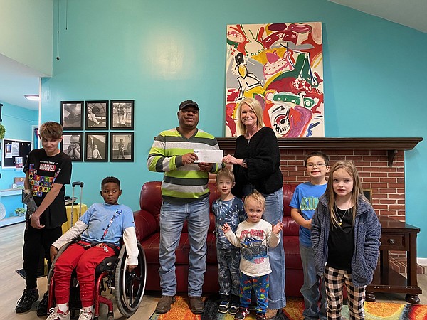 PHOTO: Canfor makes donation to HOPE Landing | El Dorado News