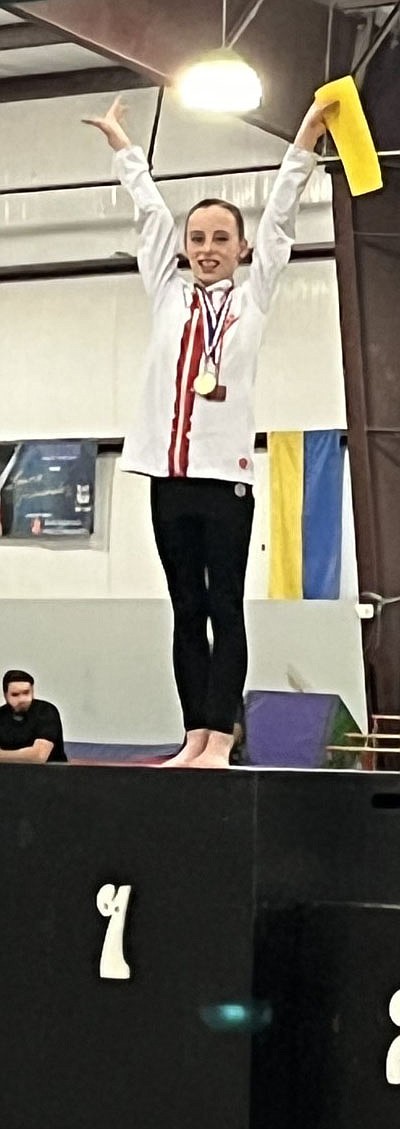 Area gymnast ia Texas State Champion on balance beam in her age ...