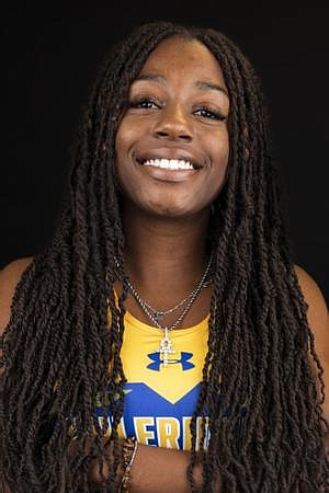 Ervin breaks heptathlon record, Smith wins 100 meters