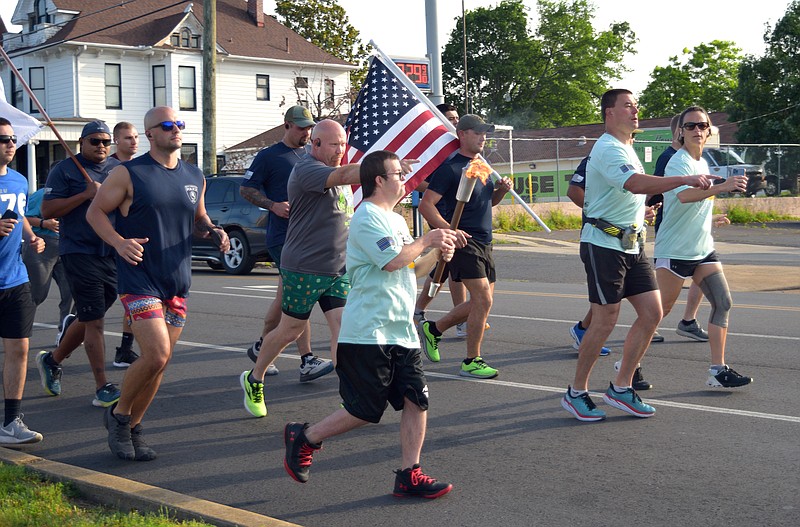 WATCH | Officers join in Special Olympics Torch Run
