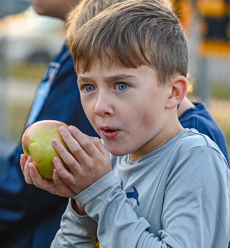 Trinity Lutheran School students ingest lesson with apple | Jefferson ...