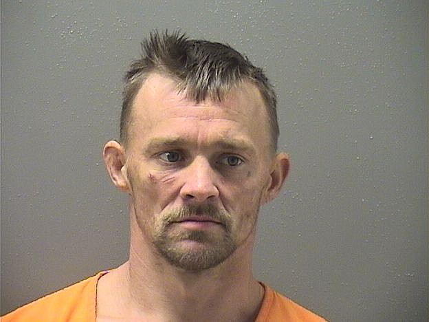 Felon arrested after allegedly pointing gun, fighting officers | Hot ...