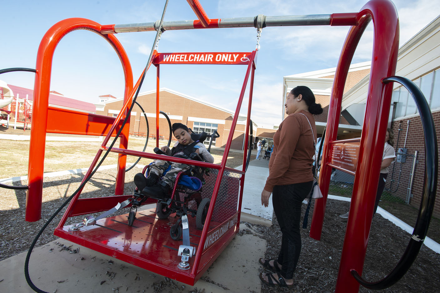 Wheelchair swing provides fun for special needs students at Springdale ...