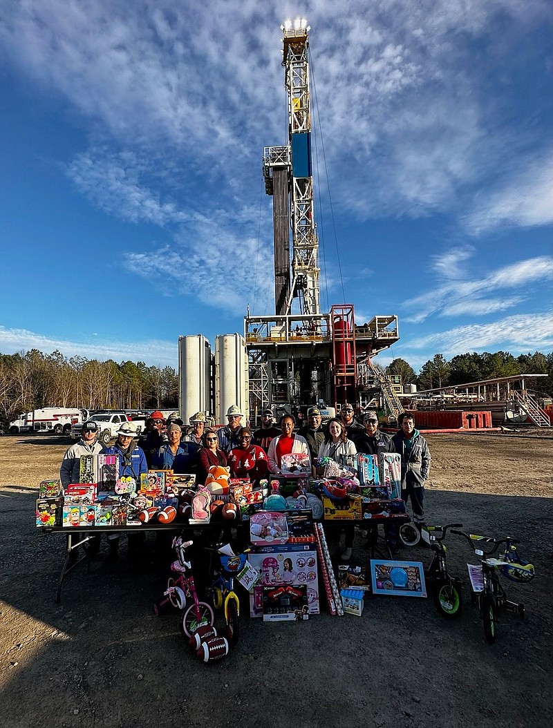 Exxon employees donate toys to local children | Magnolia Banner News