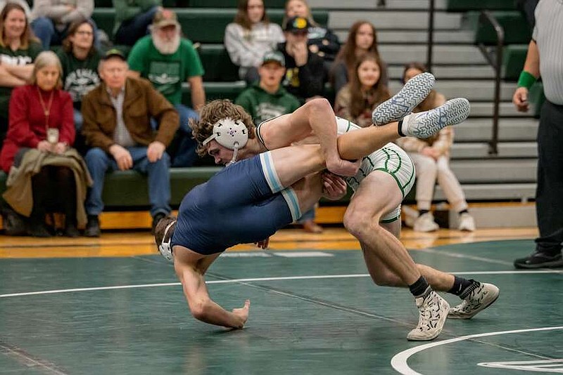 Class 1 No. 10 NC boys wrestling loses home opener to Class 1 No. 2 ...
