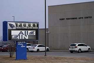 Principal who risked his life during a high school shooting has died ...