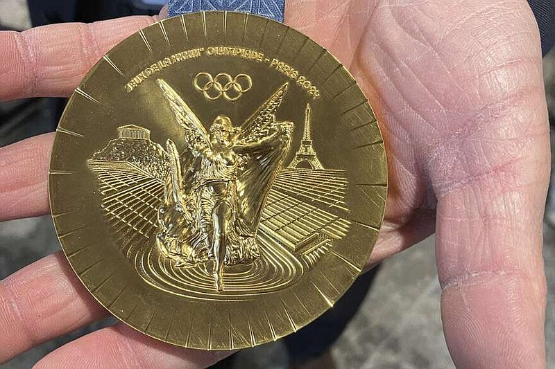 Paris Olympics medals made with pieces of Eiffel Tower | Magnolia ...