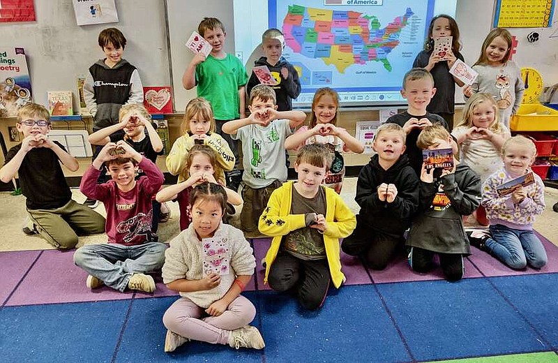 First graders enjoy 'Love Makes the World Go Round' project | Westside ...